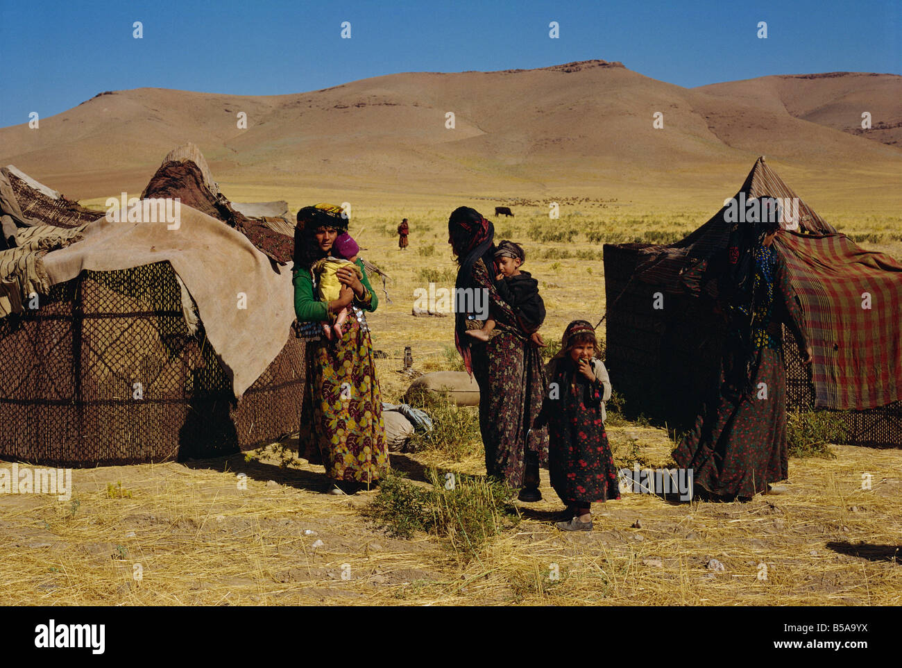 Kurdish family group outside tents, Kermanshah, Iran, Middle East Stock ...