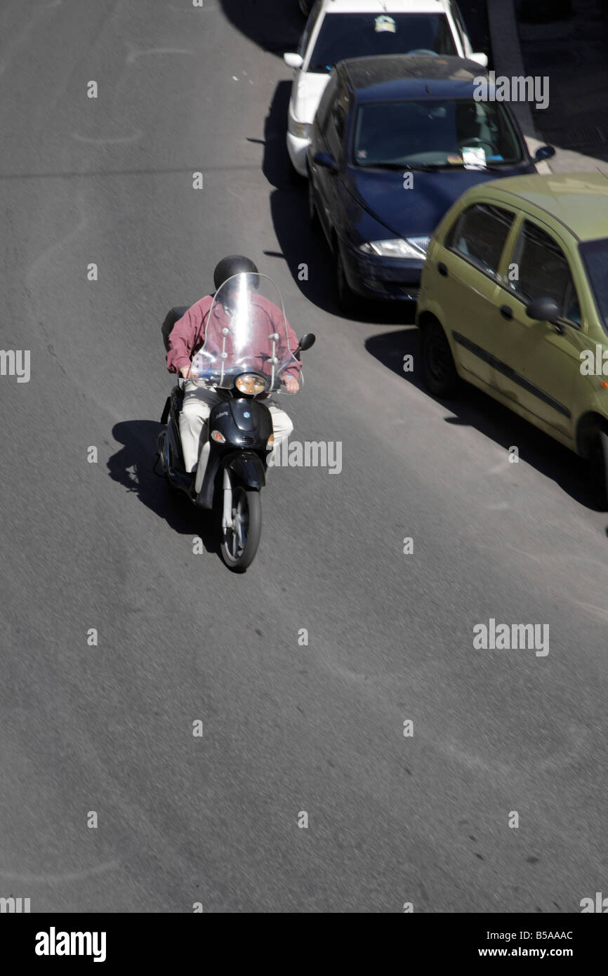 man on scooter seen from above Stock Photo - Alamy