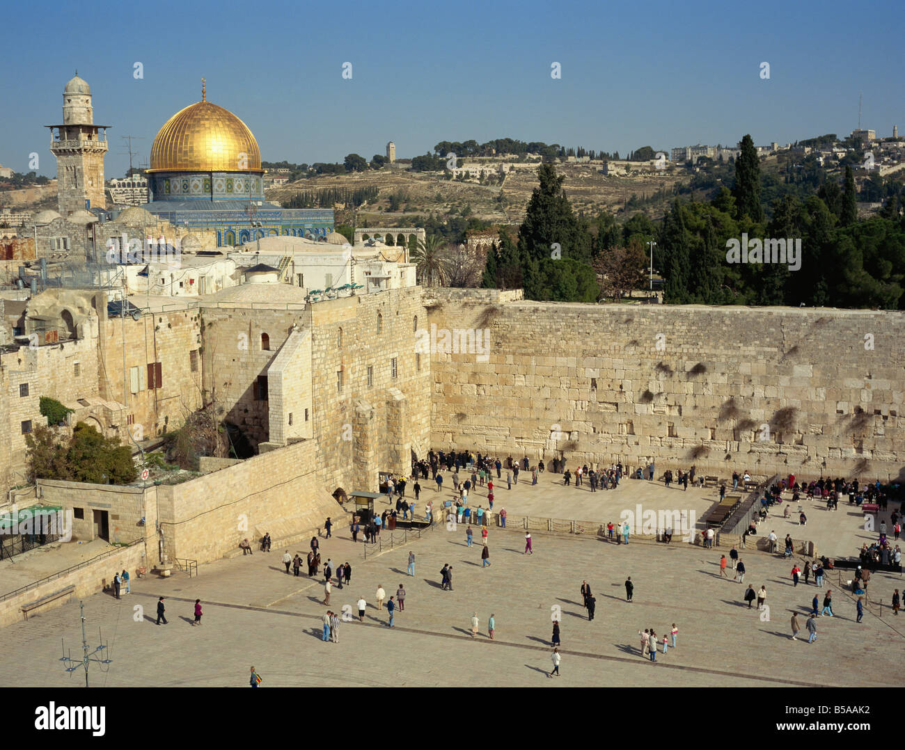 Western or Wailing Wall, sacred site of Judaism, with the gold Dome of ...