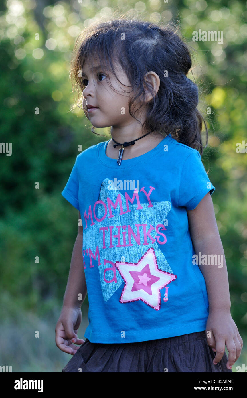 a little girl in a blue teeshirt Stock Photo - Alamy