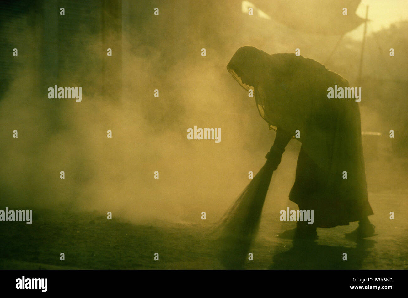 Woman sweeping floor india hi-res stock photography and images - Alamy