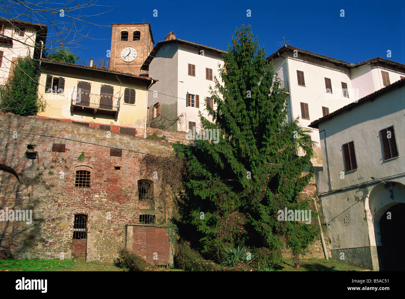 Houses and clocktower in the medieval quarter of the town of ...