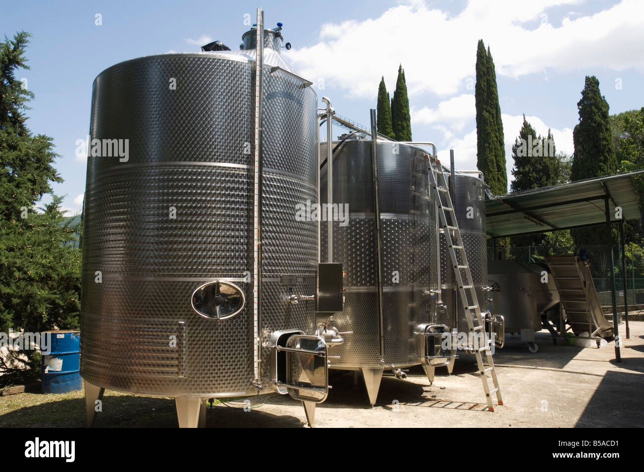 Stainless steel fermentation vats at the Villa Vignamaggio, Chianti ...