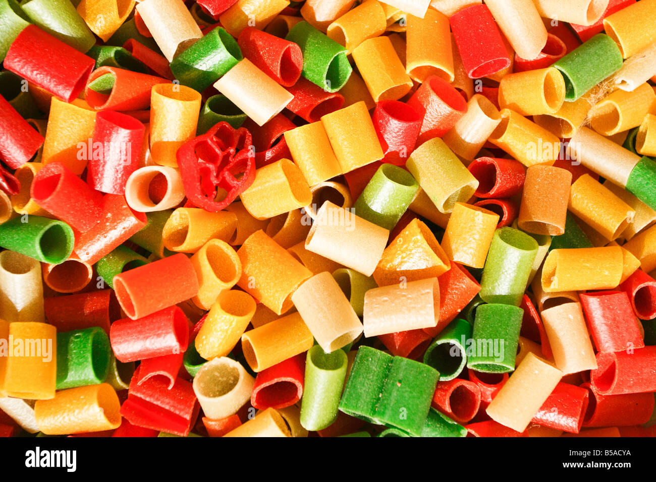 red yellow and green the colours of pasta at the market India Stock ...