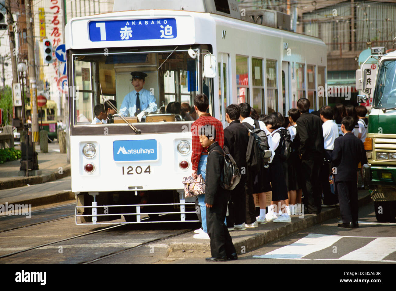 Students boarding bus hi-res stock photography and images - Alamy