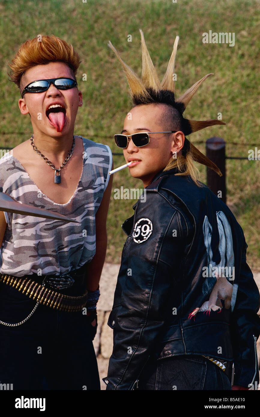 Two punks wearing sunglasses at Osakajokoen apos s Station Osaka Japan ...