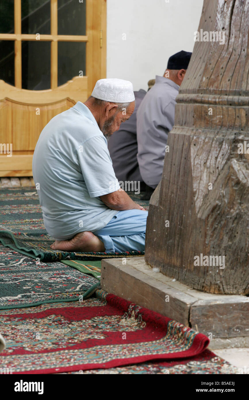 Muslim praying in the mosque, Uzbekistan Stock Photo - Alamy