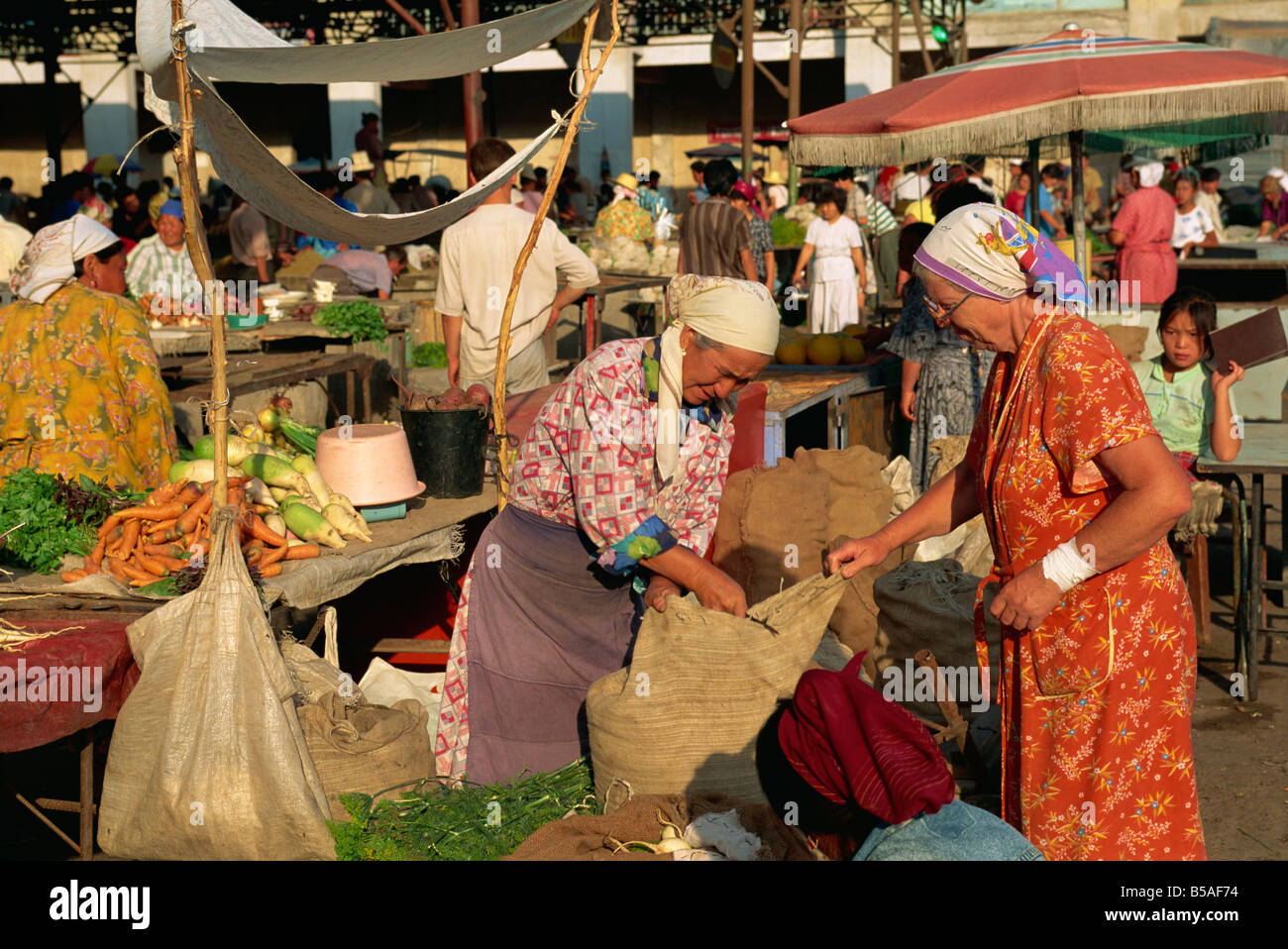 Women selling vegetables in the Osh Bazaar in Bishkek Kyrgyzstan ...