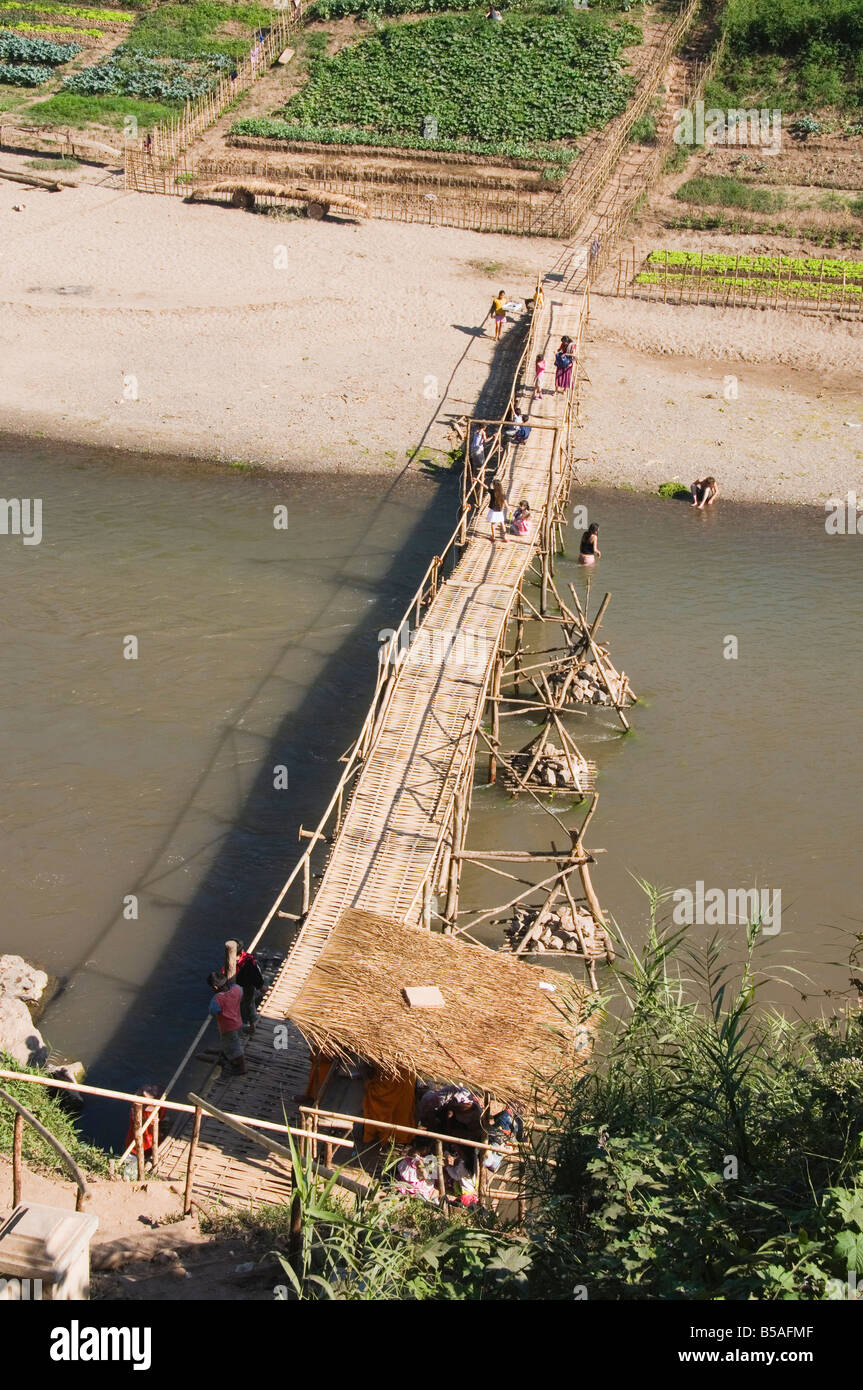 Laos river bridge hi-res stock photography and images - Alamy