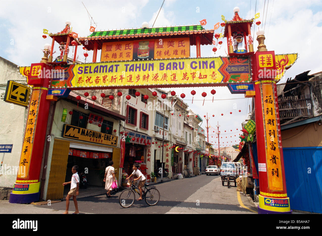 Colourful gateway and street scene in the town of Malacca in Malaysia ...