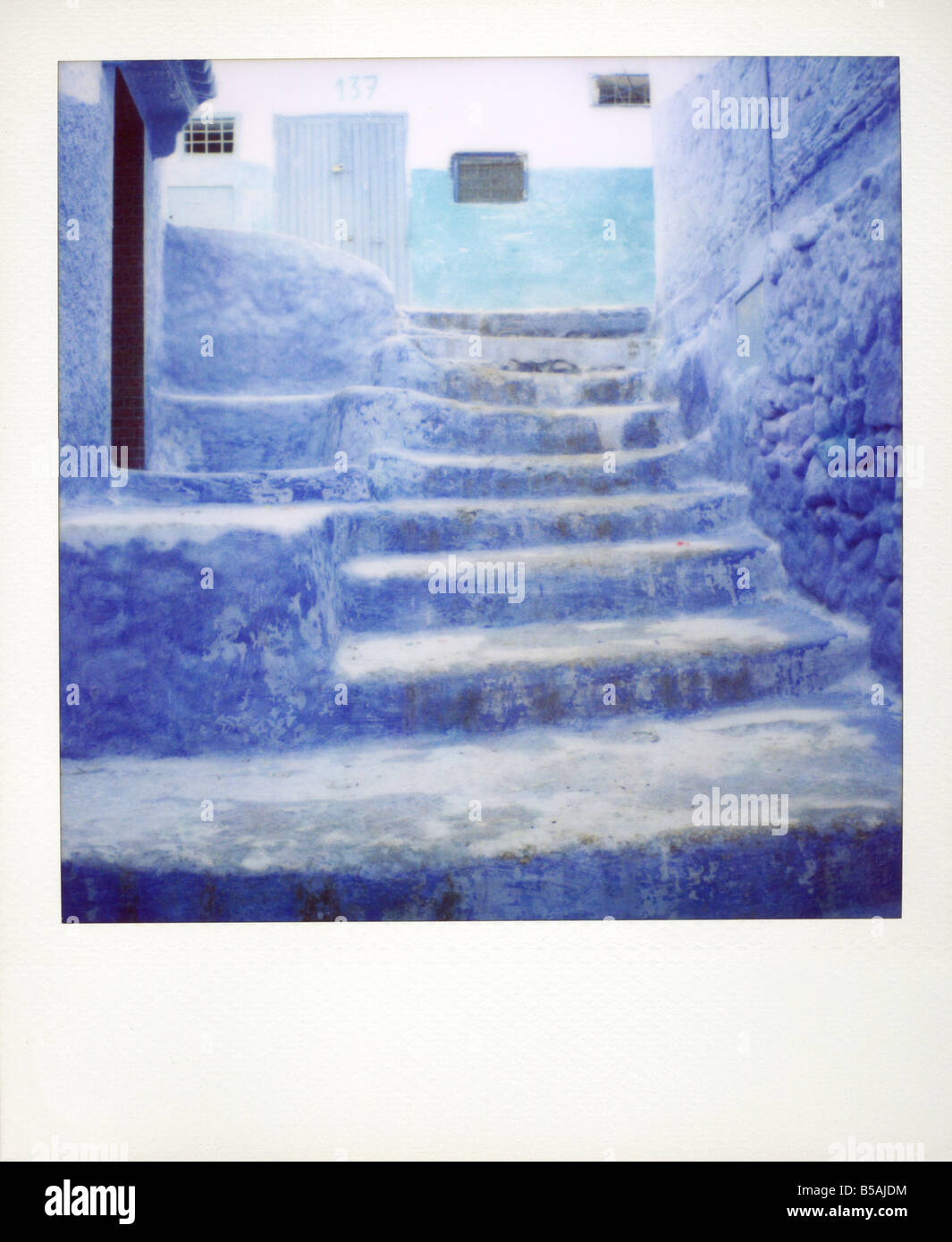 Polaroid of traditional bluewashed steps Chefchaouen Morocco North ...