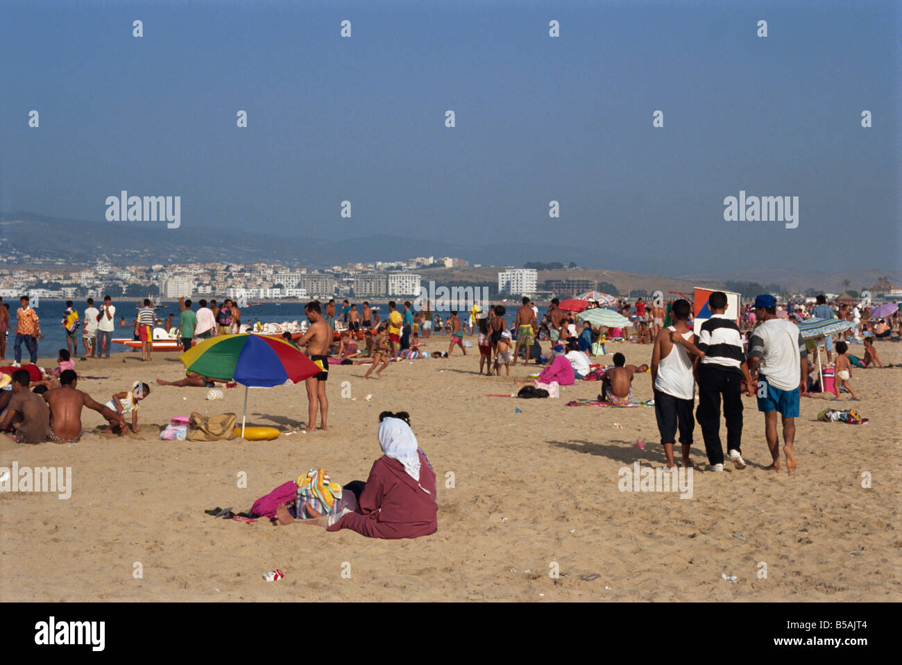 People on the main beach at Tangiers Morocco Africa G Thouvenin Stock ...