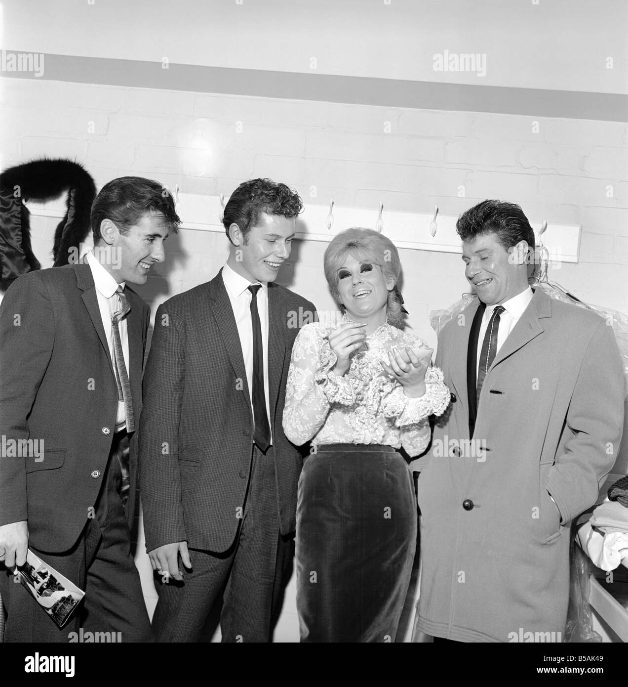 Singer Dusty Springfield seen here signing autographs. Circa 1962 Stock ...