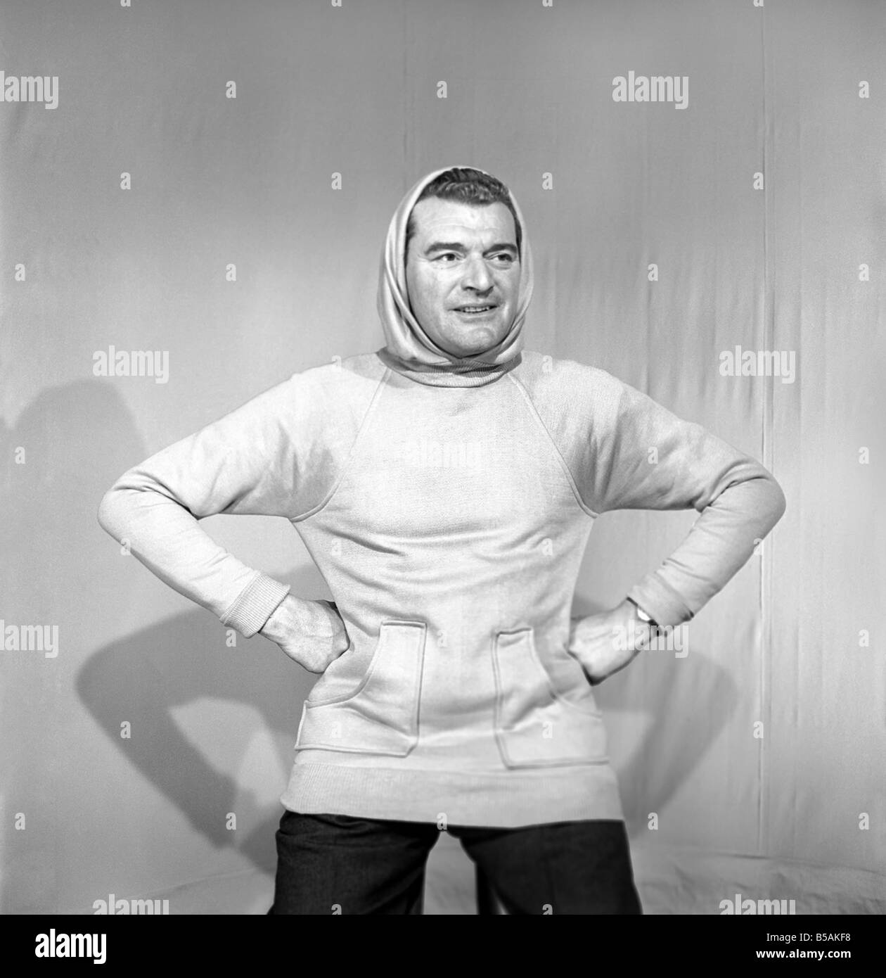 Clothing: Fashion: Menswear. Man wearing hooded sweat shirt. 1958 B116 ...