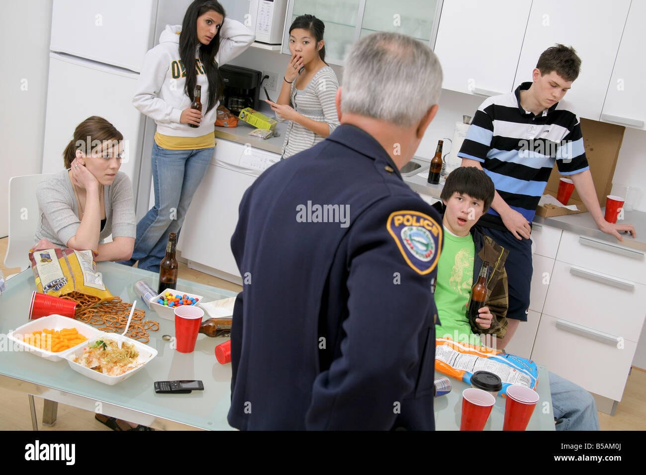 Police breaking up party hi-res stock photography and images - Alamy