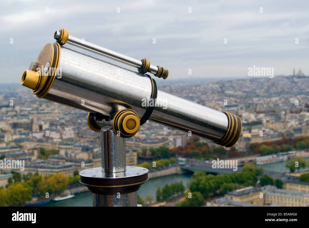 Eiffel Tower Telescope pointing to Paris City Stock Photo - Alamy