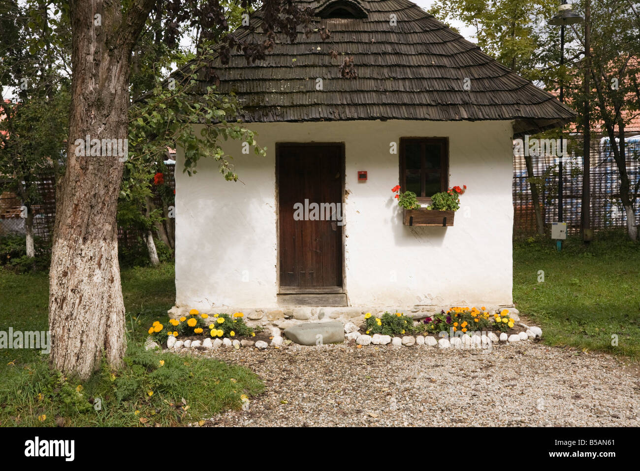 Traditional 19th century cattle shed building in peasant Village Museum ...
