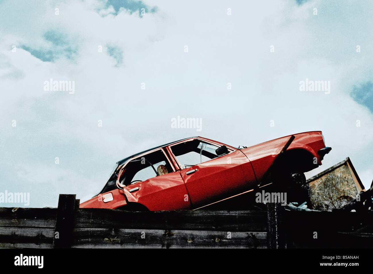 Old Red Car On Scrap Heap Stock Photo - Alamy