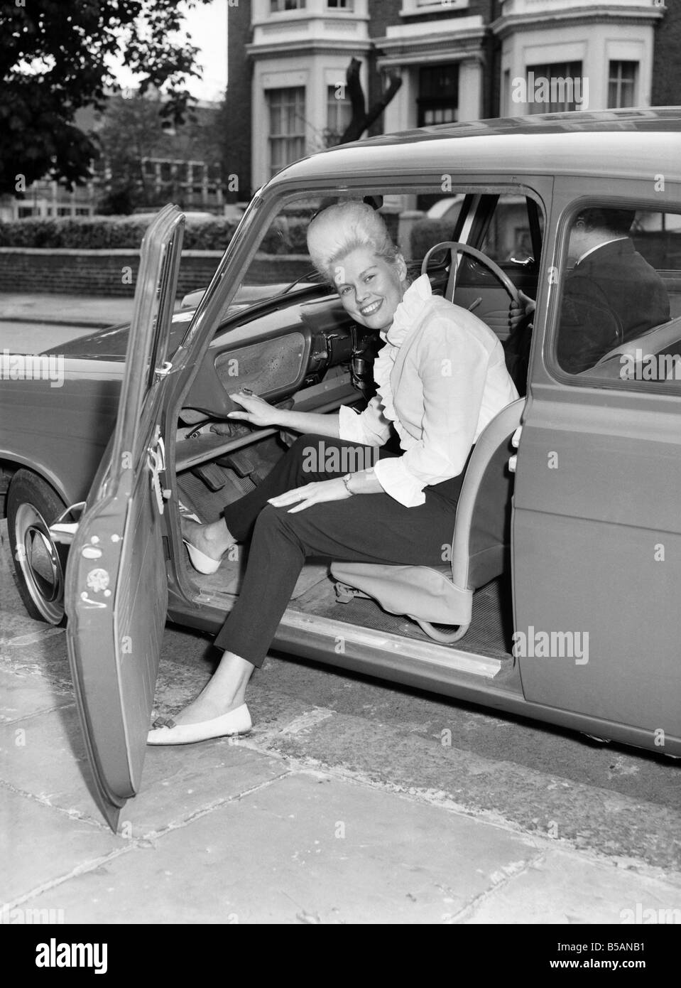Tina Butler, woman driving instructor seen here giving a driving lesson ...
