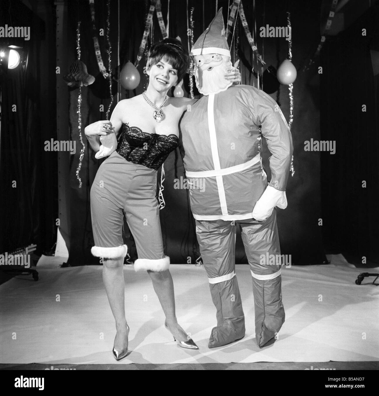 Model Kim Tracy seen here dressed for the office Christmas Party. 1960 ...
