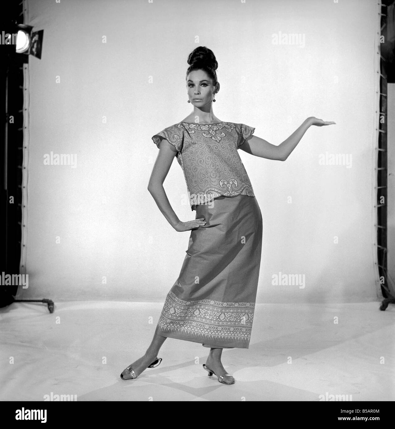 Imogen Woodford modelling a outfit with a far eastern influence. 1965 ...