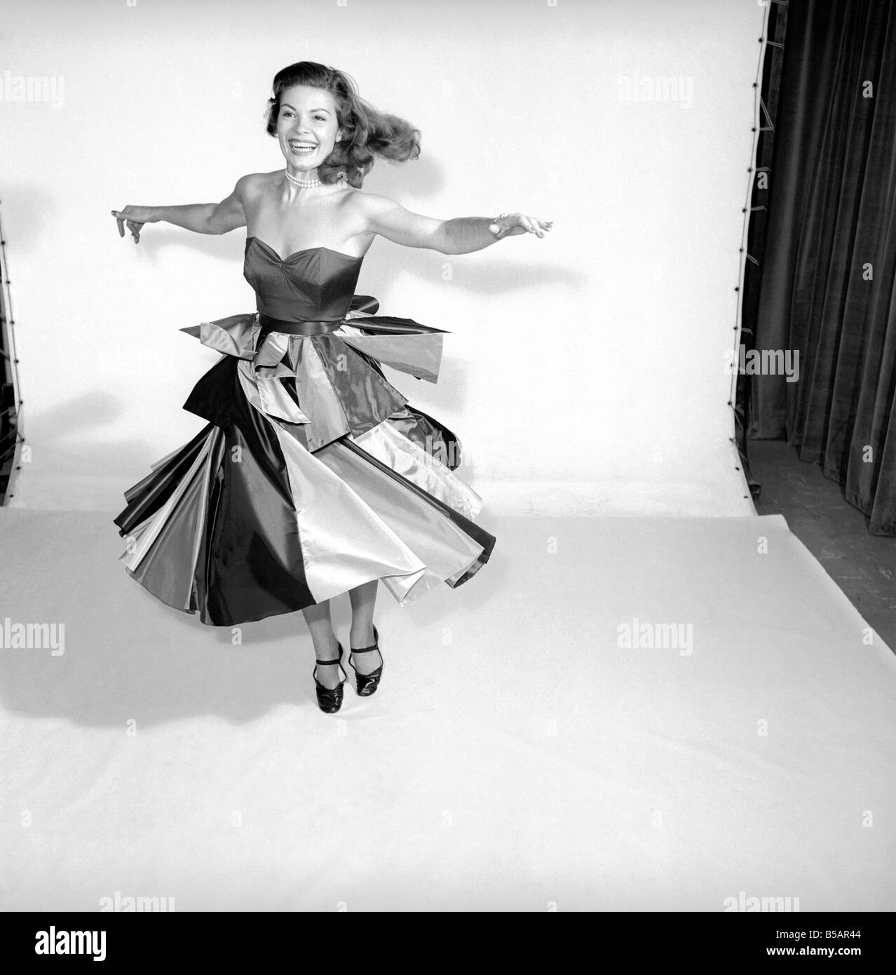 Clothing: Fashion: Skirts: Woman wearing flying panel dress. Model: Pat ...