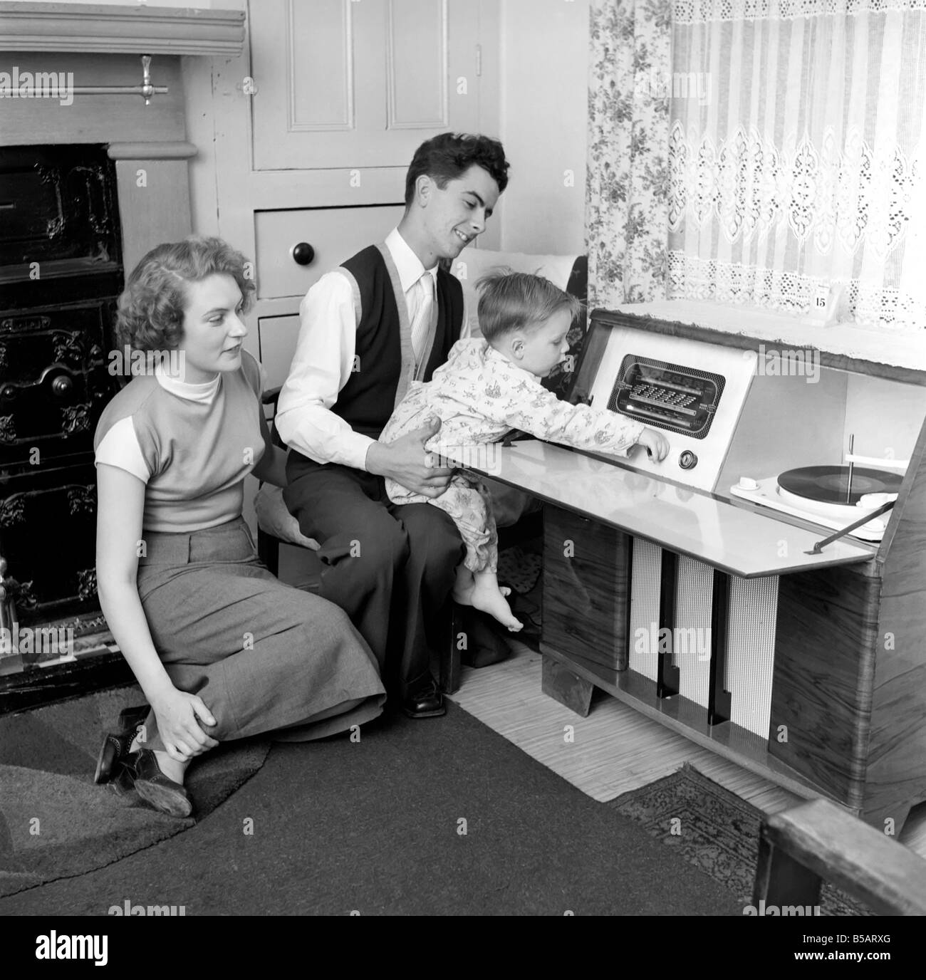 Family Listening To Radio