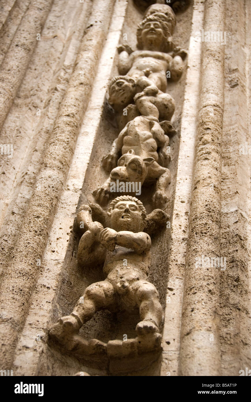 Detail of stone carved figures around the doorway of La Lonja de la ...