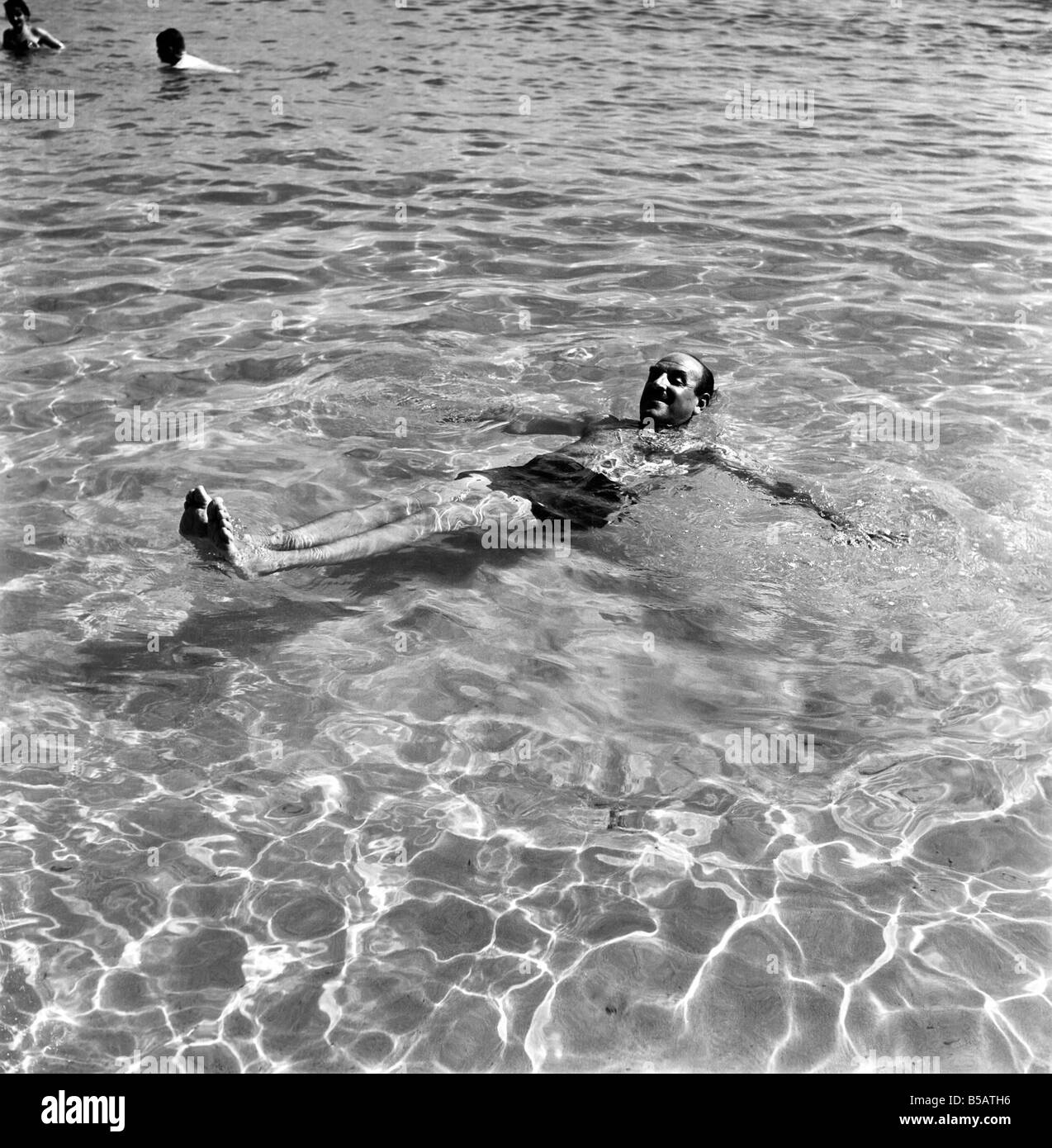 1950s man beach hi-res stock photography and images - Alamy