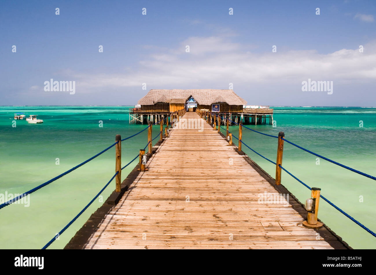 A pier leading to the Bravo Club on Kiwengwa Beach Zanzibar Tanzania ...