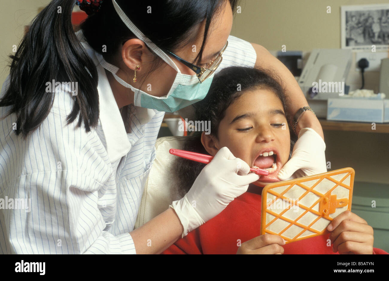 young girl having dental checkup Stock Photo - Alamy