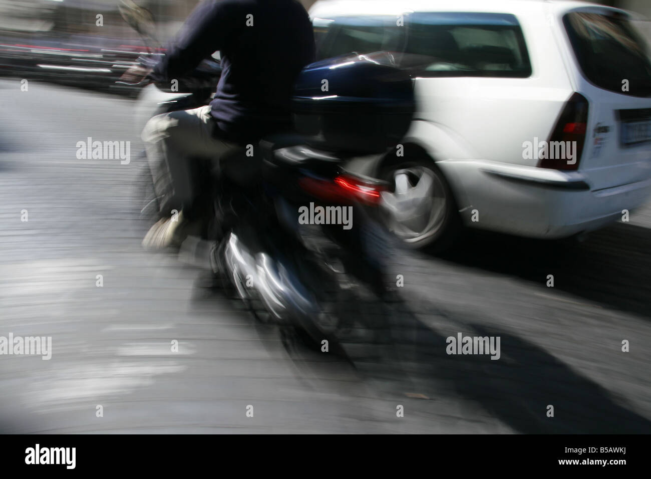 Riding scooter moped in rome hi-res stock photography and images - Alamy