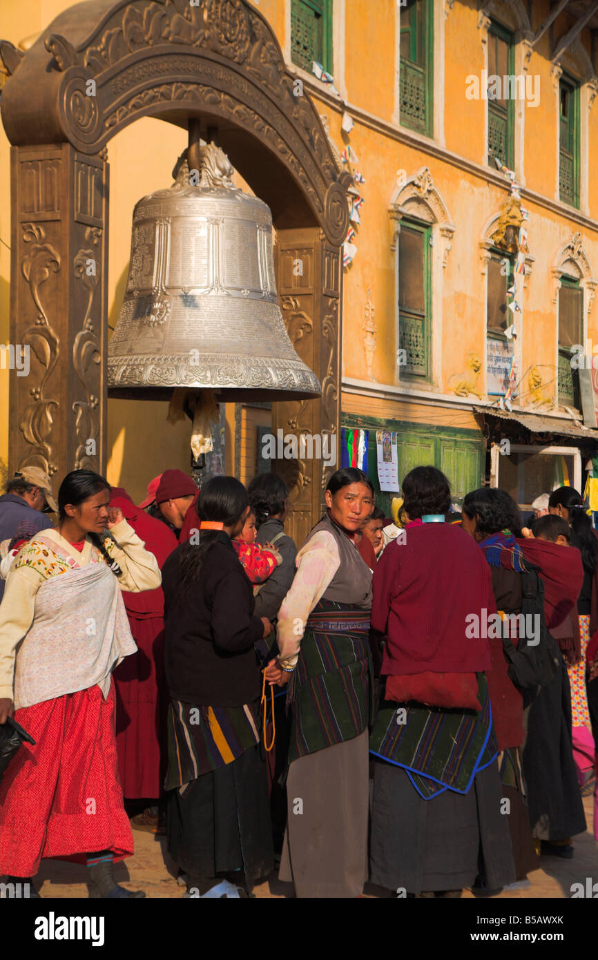 People near bell in front of monastery, Lhosar Tibetan and Sherpa New ...