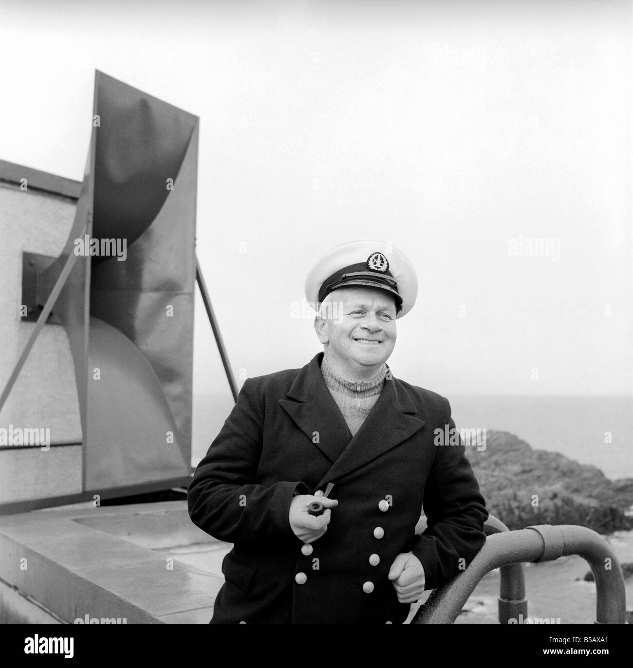 The lighthouse keepers and their families go about their daily duties ...