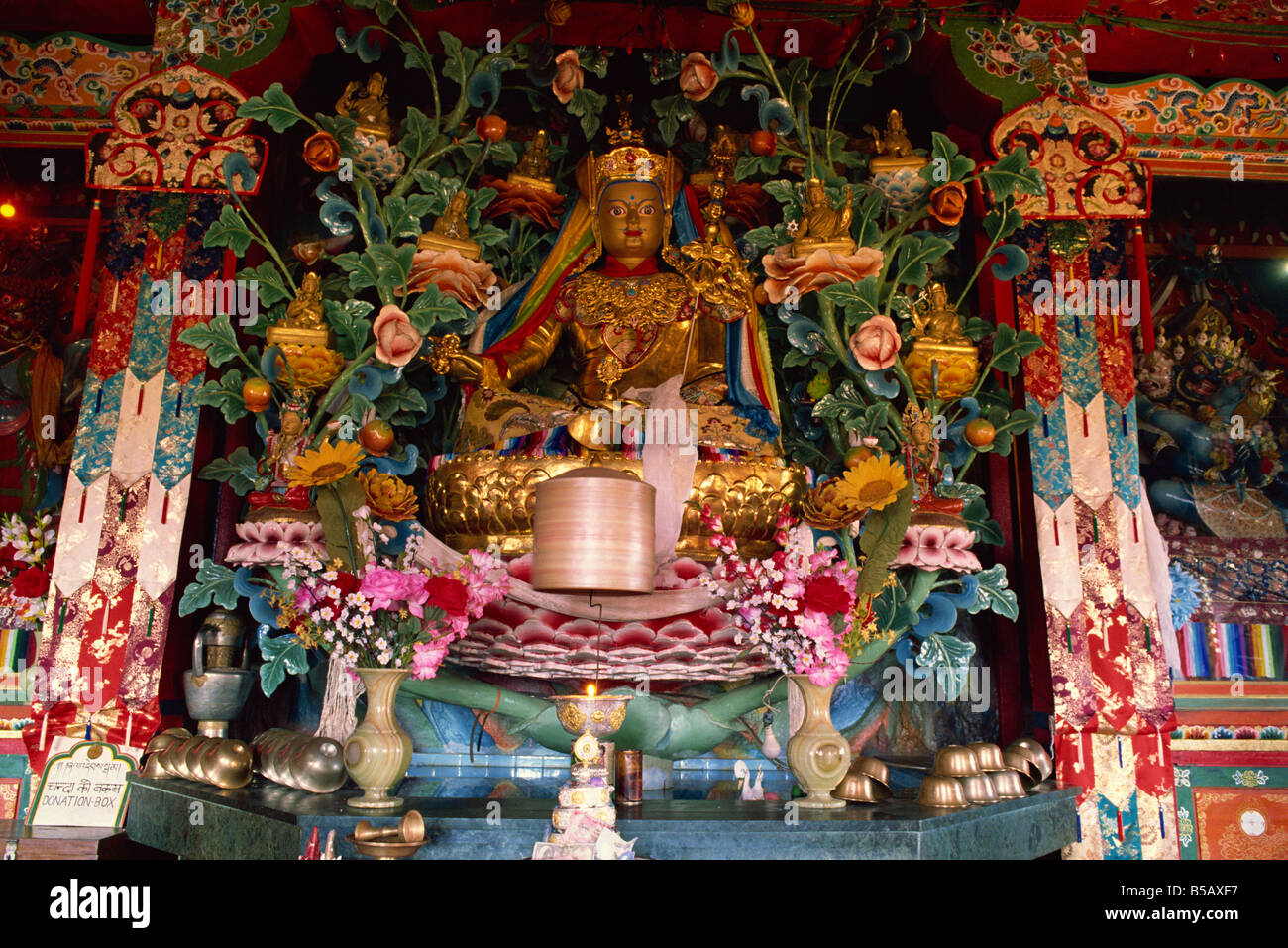 The figure of Padmasambava with rubber duck on the Tibetan altar at ...