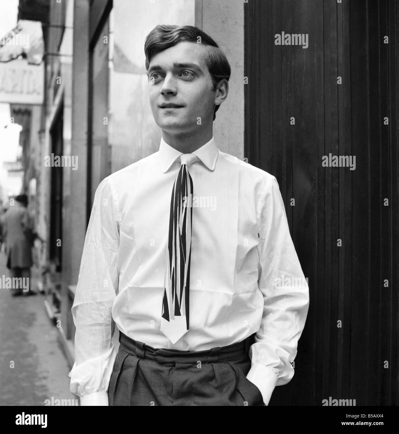Men modelling the latest 1963 menswear design's in the streets of Paris ...