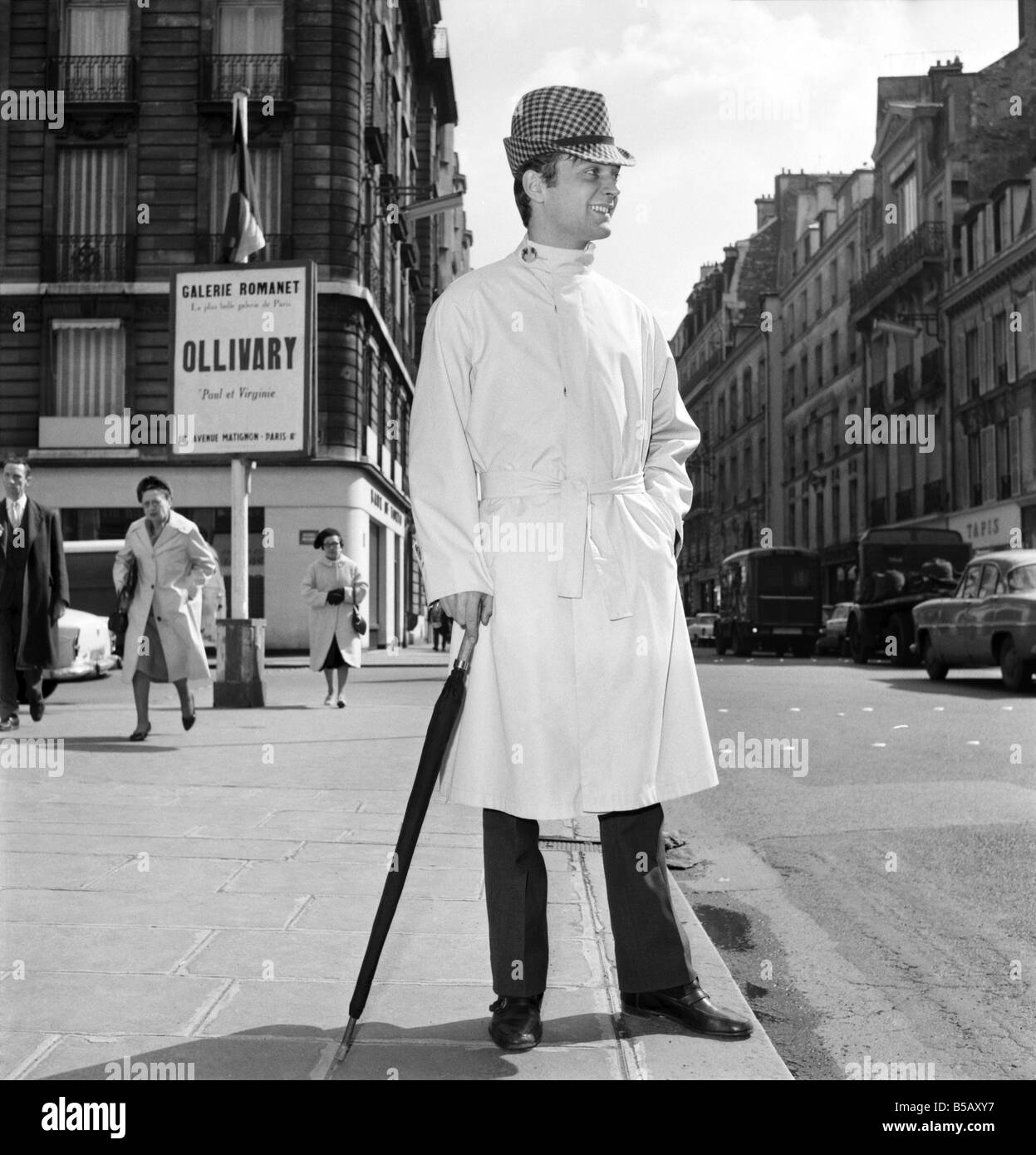 Men modelling the latest 1963 menswear design's in the streets of Paris ...