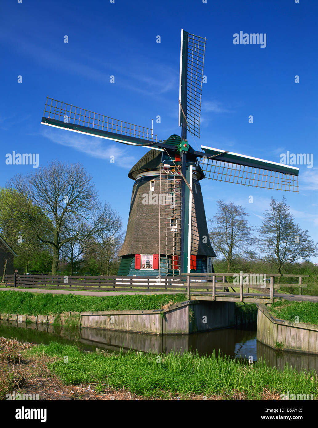 Canal and thatched windmill at Edam Holland N Francis Stock Photo - Alamy