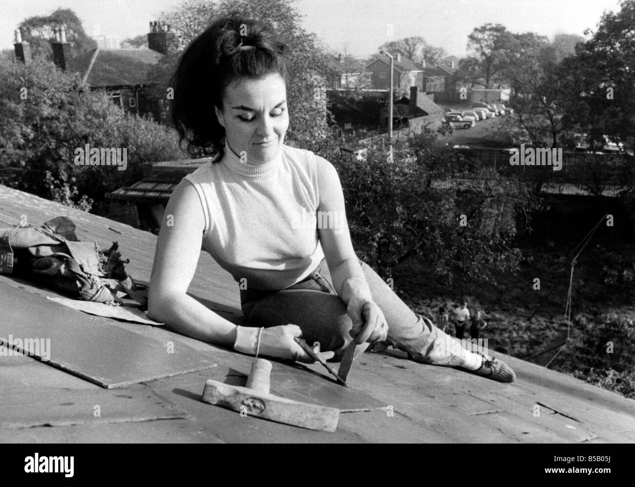 Joyce Peate, at work, high on a rooftop. October 1969 P007860 Stock ...