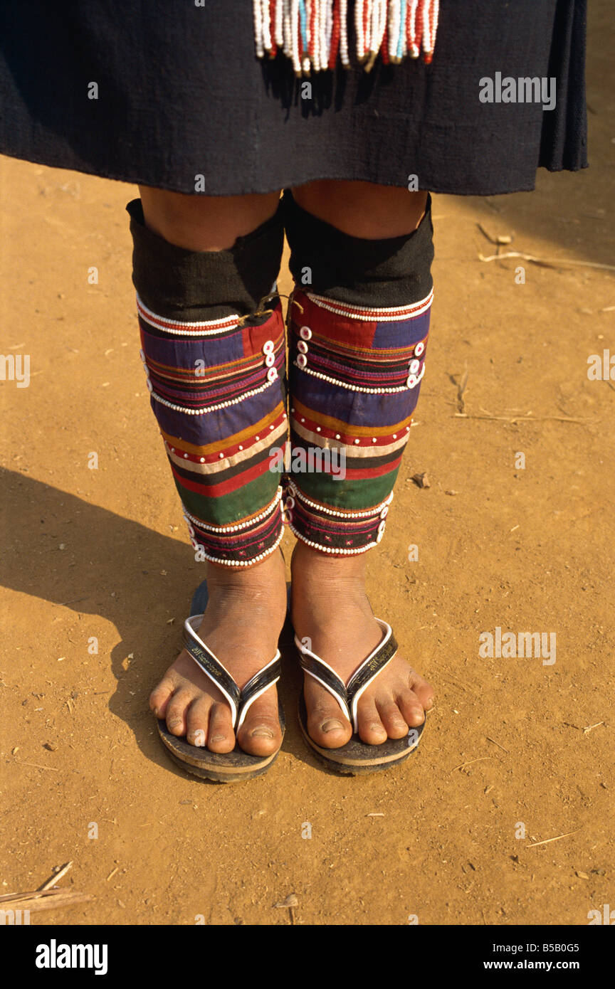 Close up of legs and feet of a person of the Akha hill tribe wearing ...