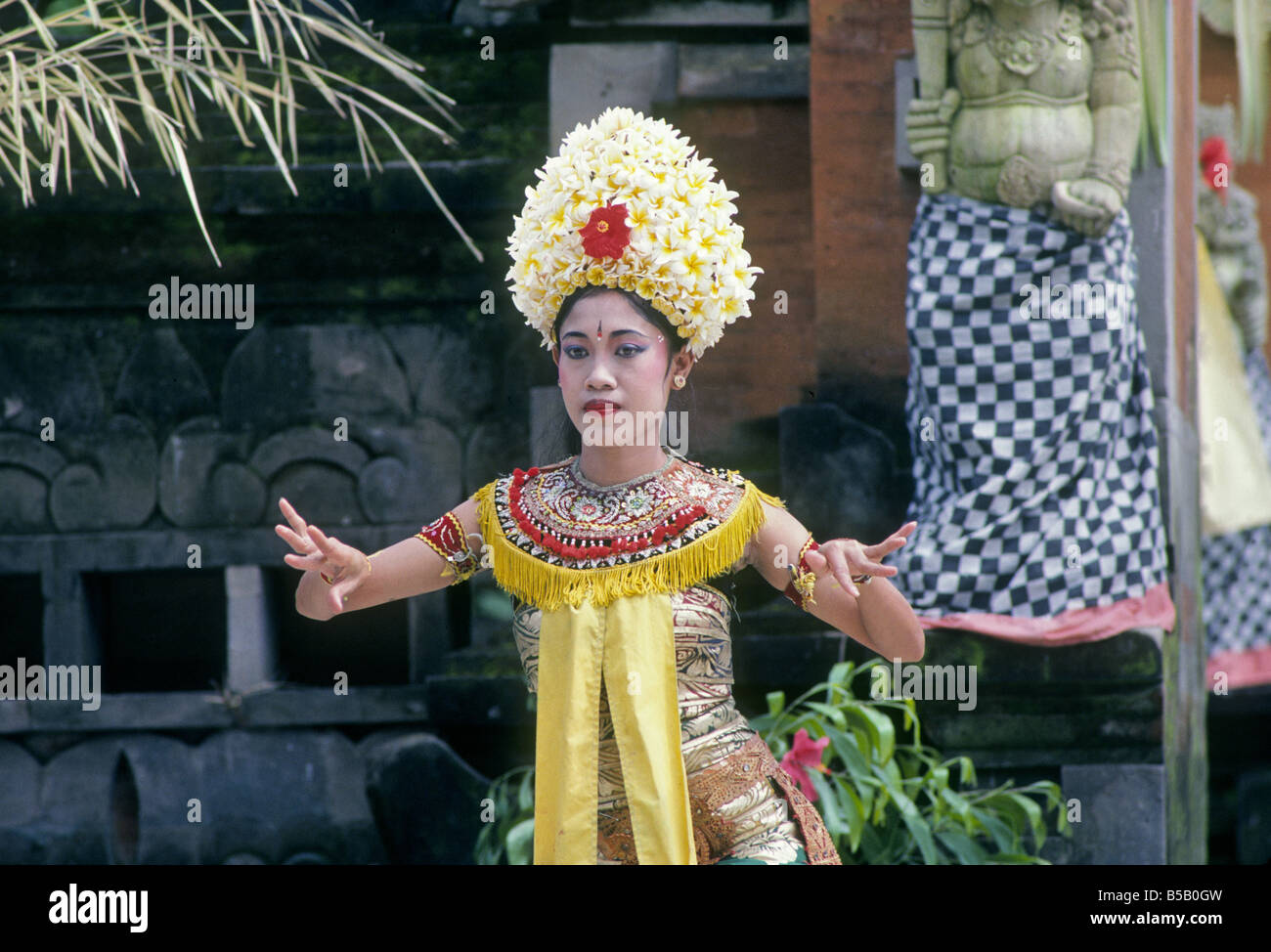 A Temple dancer at a temple festival in a small village in inland Bali ...
