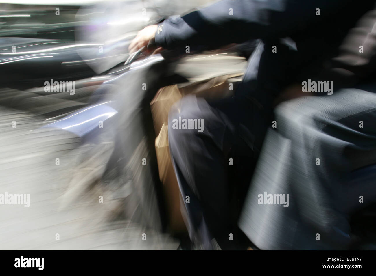 two people riding scooter moped in rome italy Stock Photo - Alamy