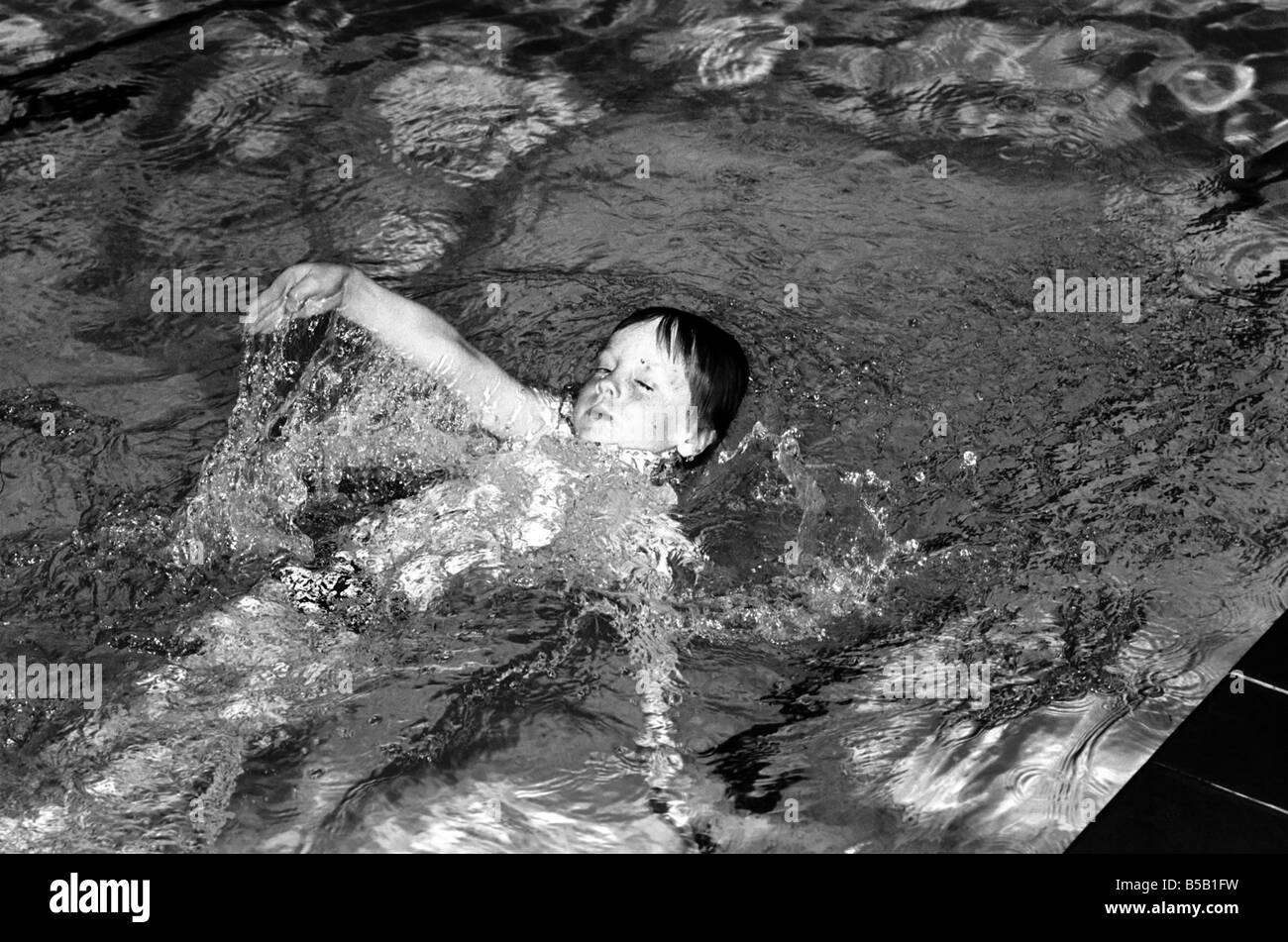 Lifeguard swimming pool Black and White Stock Photos & Images - Alamy