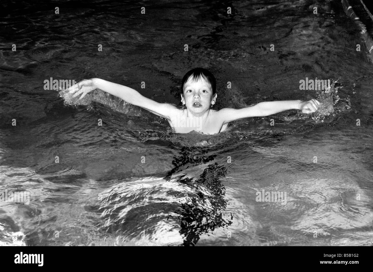 Lifeguard swimming pool Black and White Stock Photos & Images - Alamy