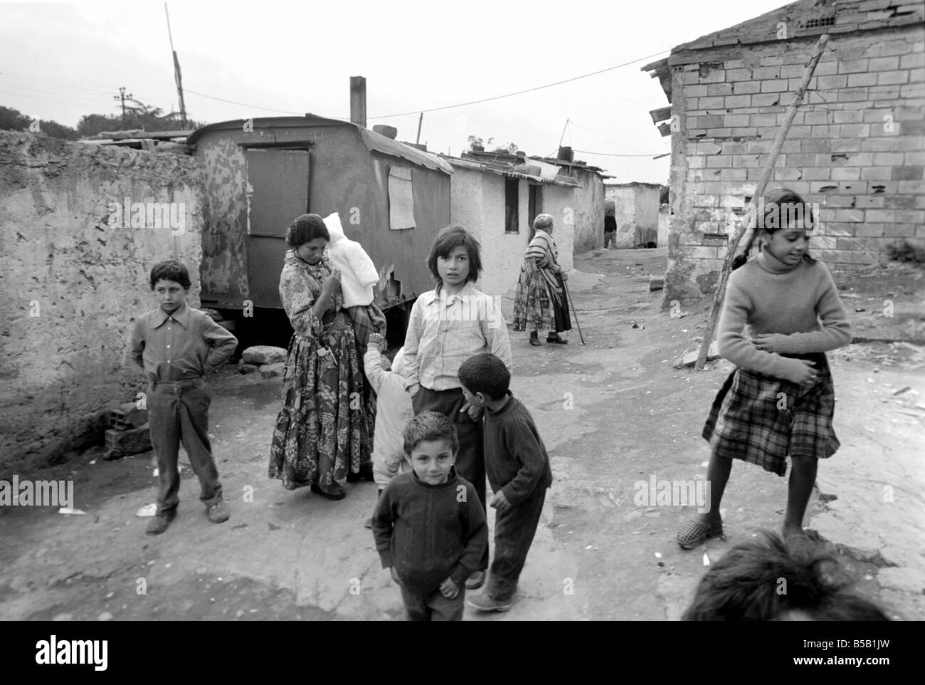 AMother and children in a poor suburb on the outskirts of Rome, Italy ...