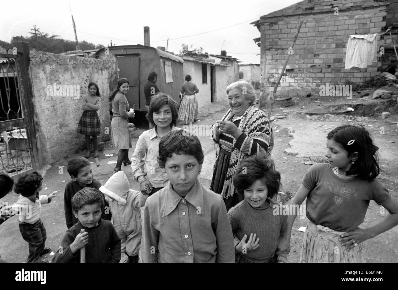 Children and reisdents on the streets in a poor suburb on the outskirts ...
