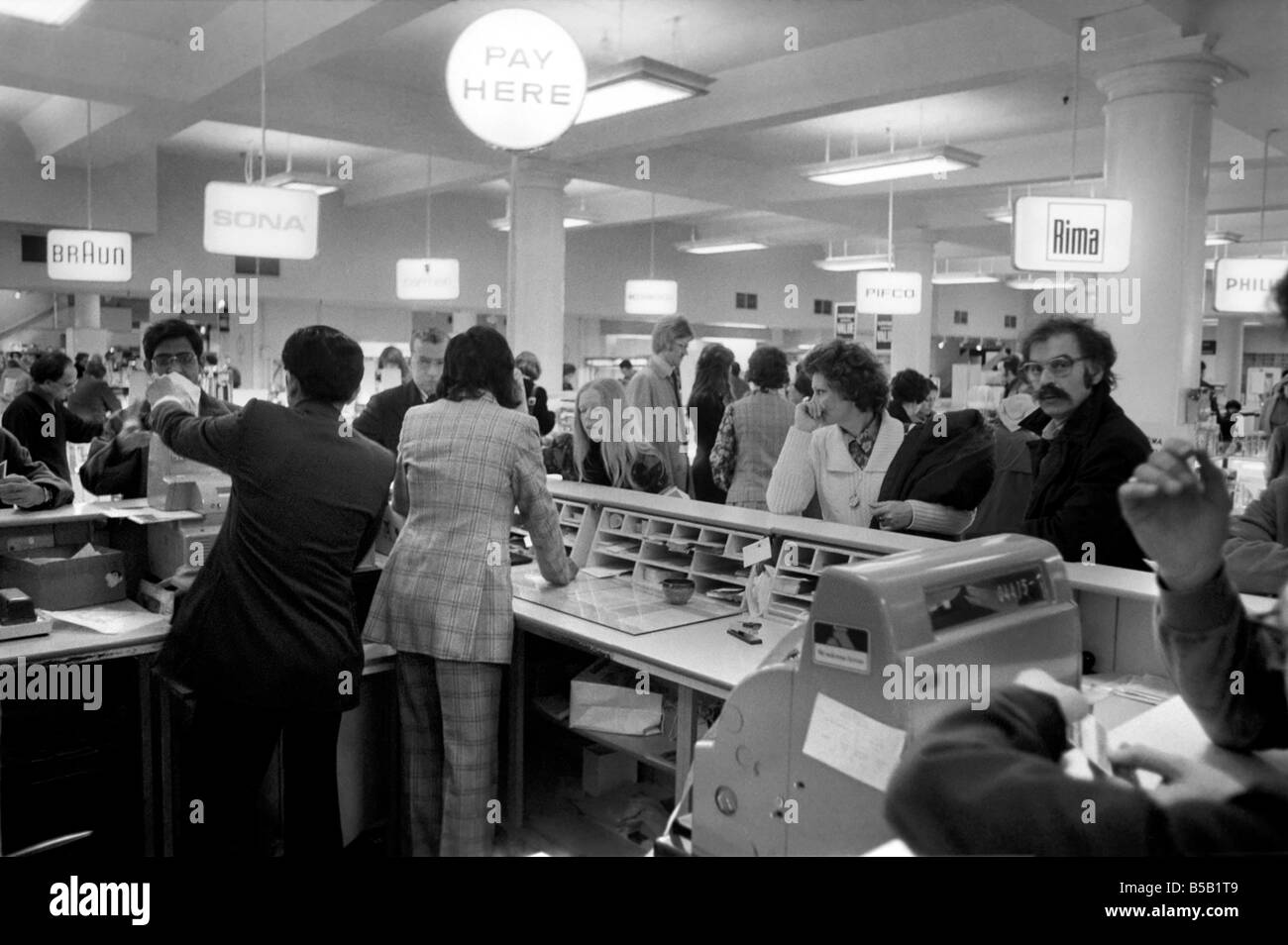 Customers At The Cash Desk In The Electrical Section Of Selfridges customers-at-the-cash-desk-in-the-electrical-section-of-selfridges