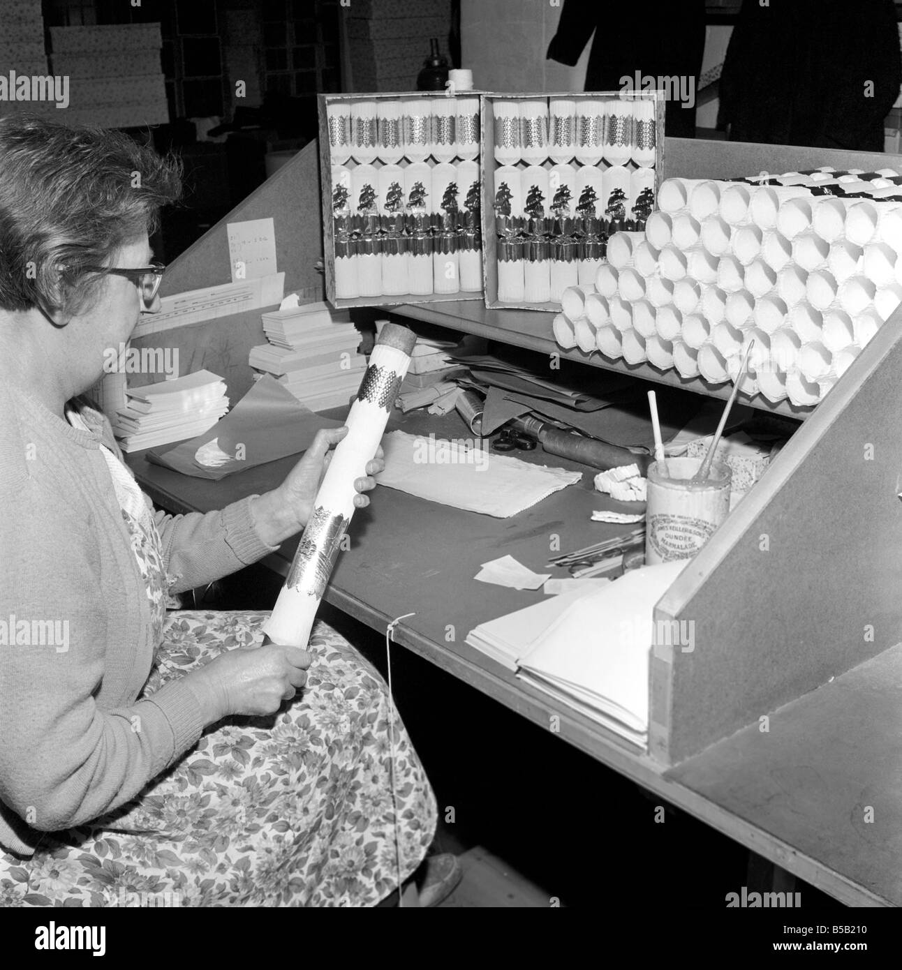 General scene in and around a Christmas cracker factory, where women ...