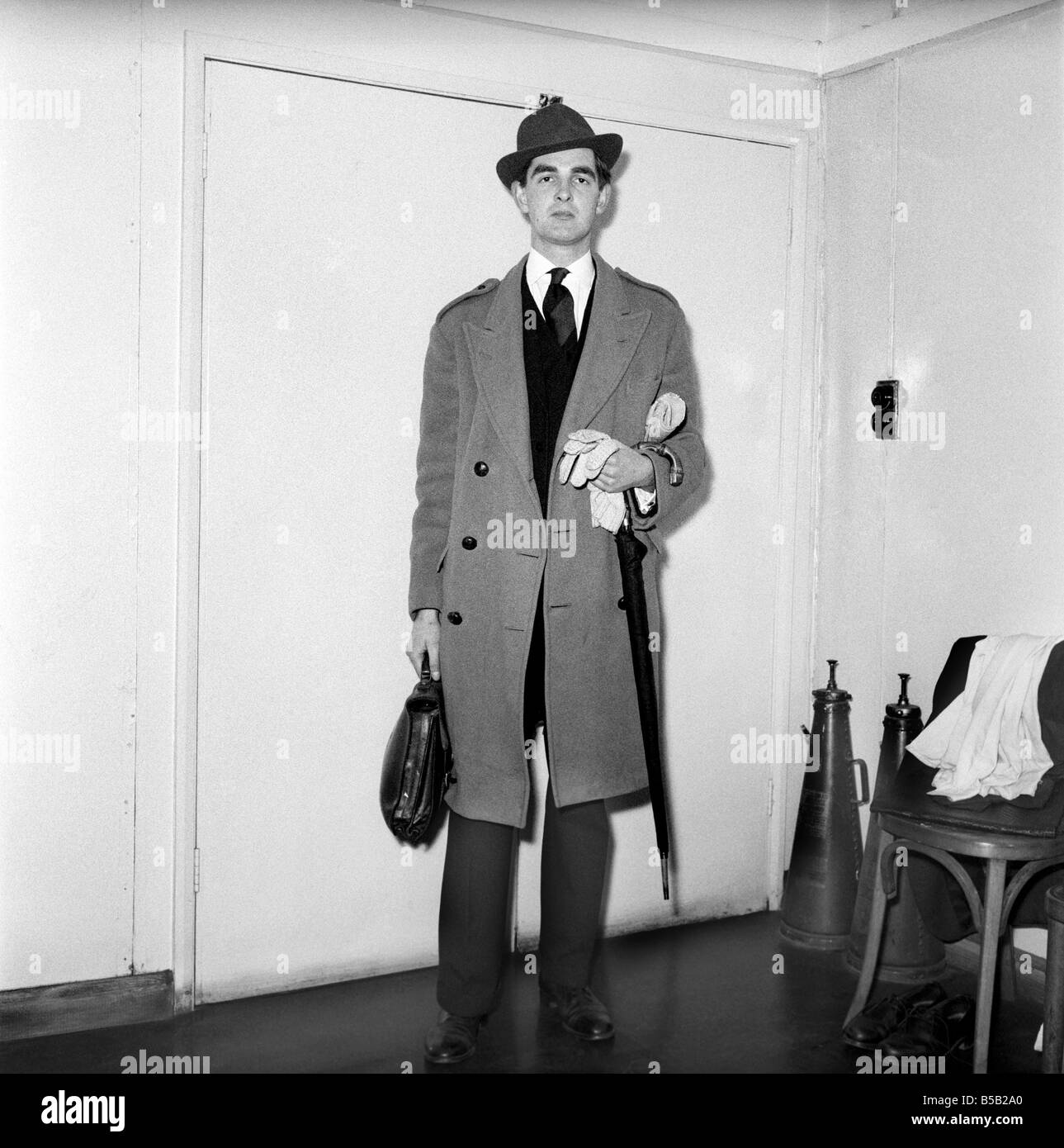 Actor Derek Nimmo dressed as a city gent. March 1957 Stock Photo - Alamy