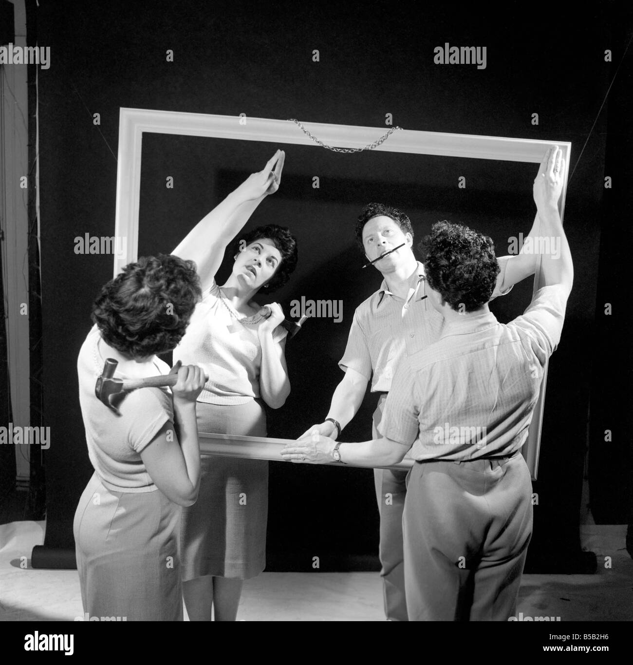 Mirror image: A couple argue in front of a mirror. 1958 Stock Photo - Alamy
